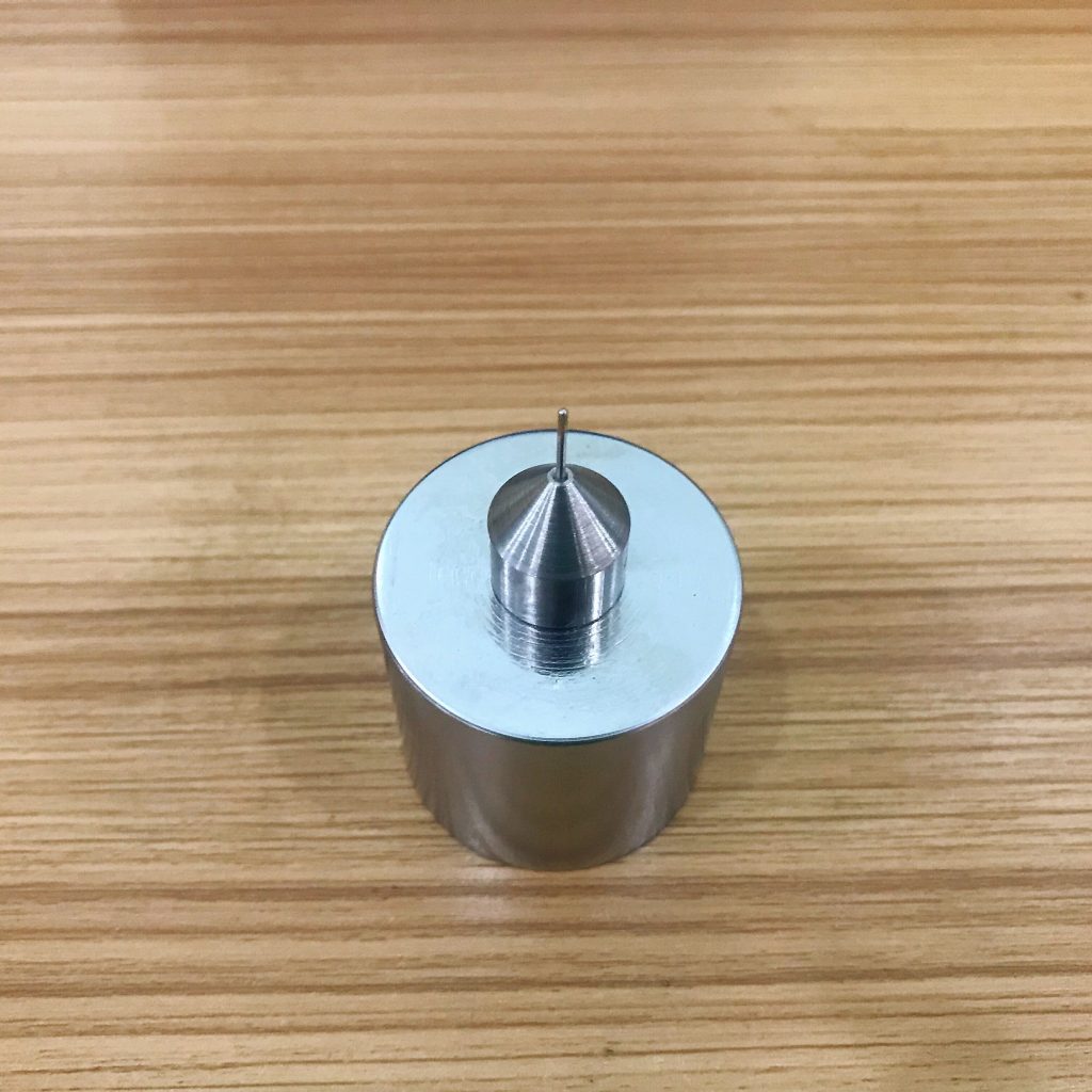 What does a Liquid Leak Test Needle do